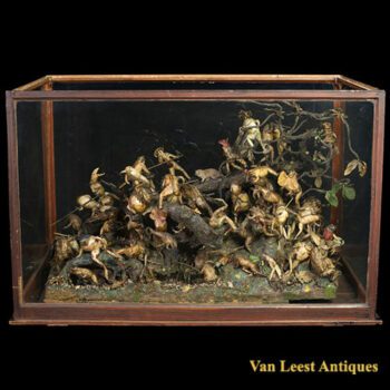 taxidermist frogs in a Jheronimus Bosch style.