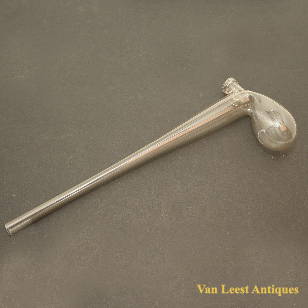 A glass retort, 18th century.